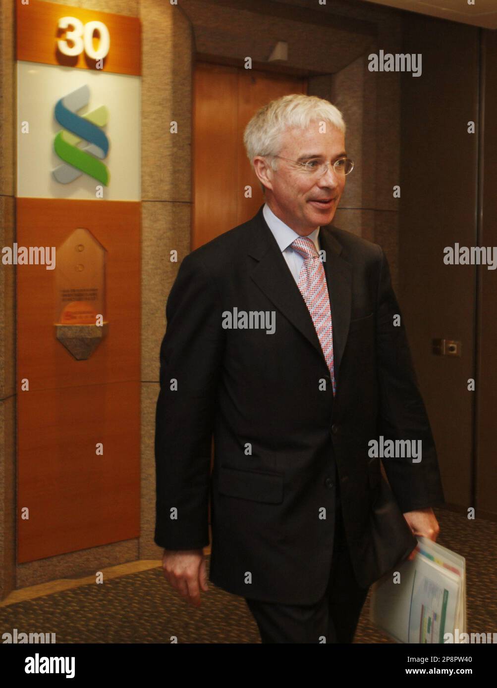 Peter Sands, Group CEO of Standard Chartered attends the news ...