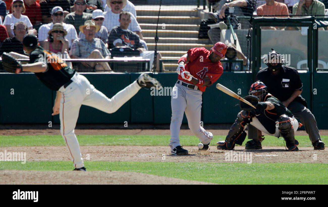 Los Angeles Angels' Gary Matthews Jr. breaks his bat on a single off ...