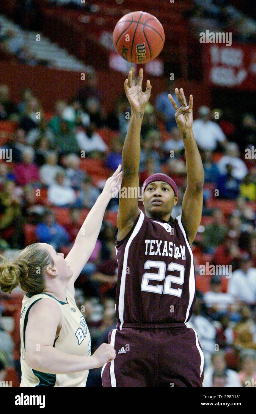 Texas A&M guard Tanisha Smith, right, shoots over Baylor's Ashley Field ...