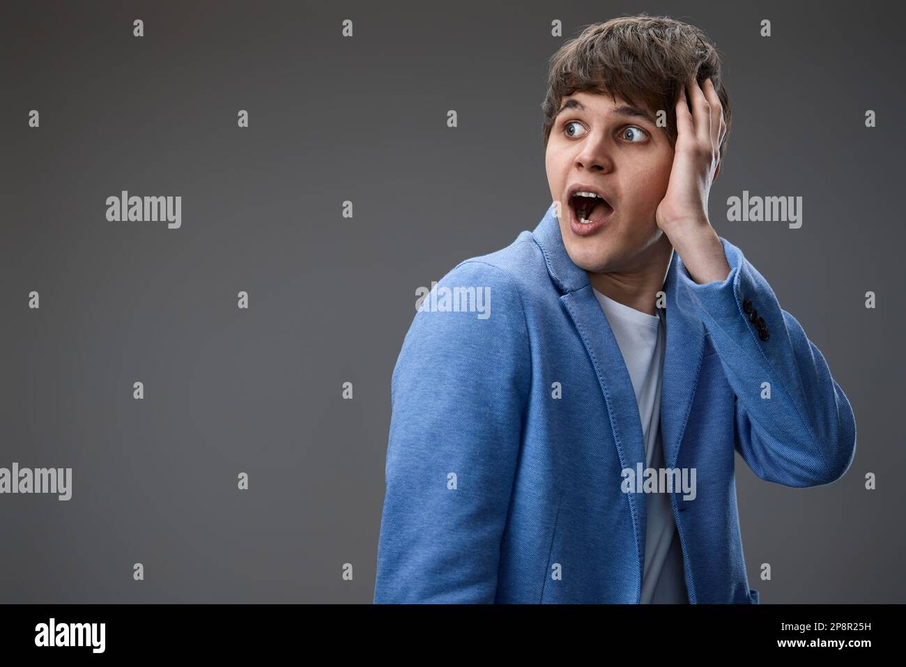 shocked man with surprise expression and excited face Stock Photo - Alamy