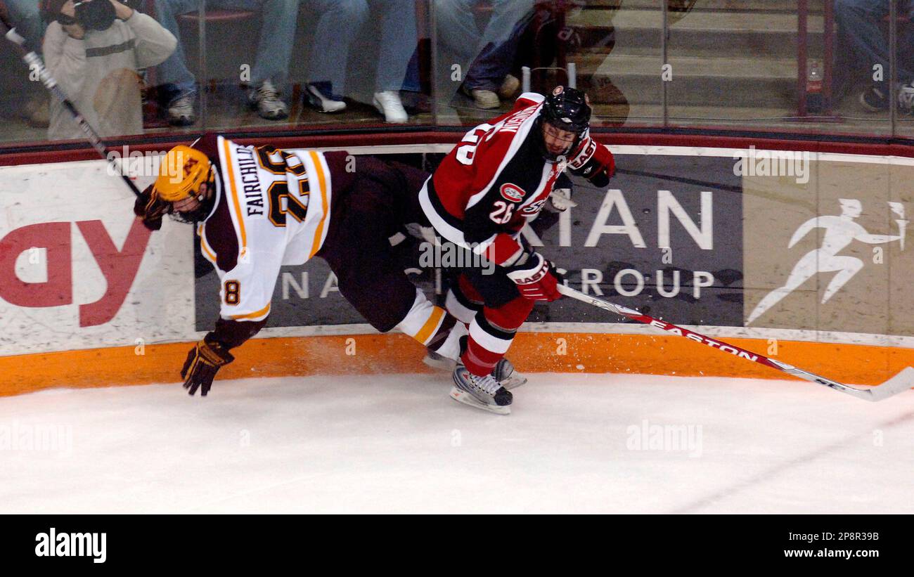 St. Cloud State's John Swanson and Minnesota's Cade Fairchild collide ...