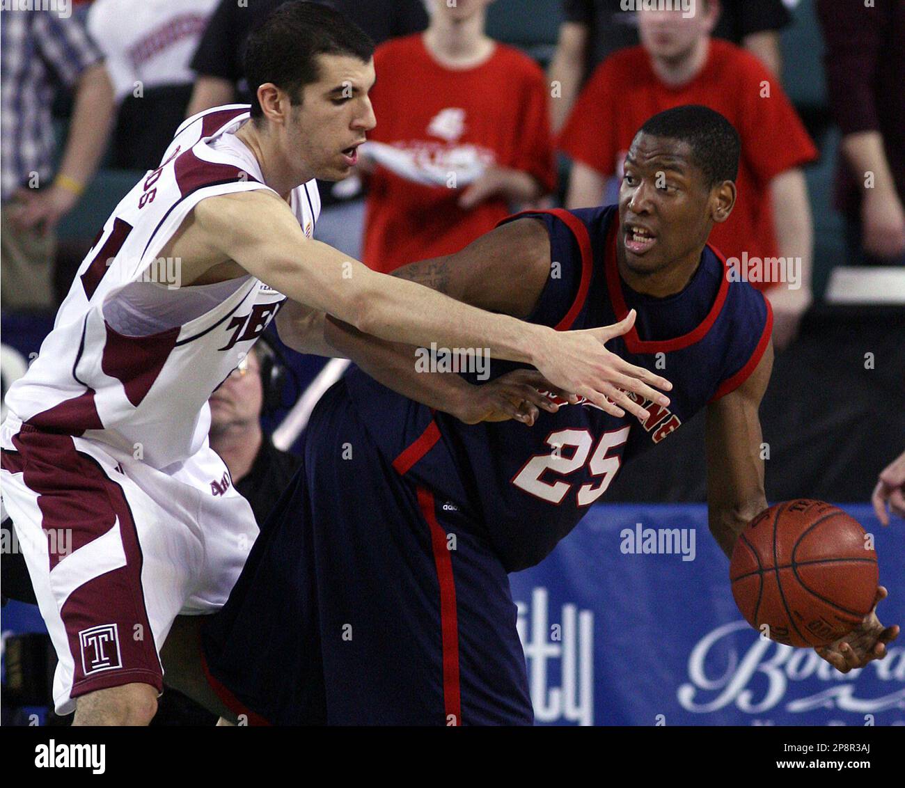 Temple's Sergio Olmos, left, pressures Duquesne's Damian Saunders in ...