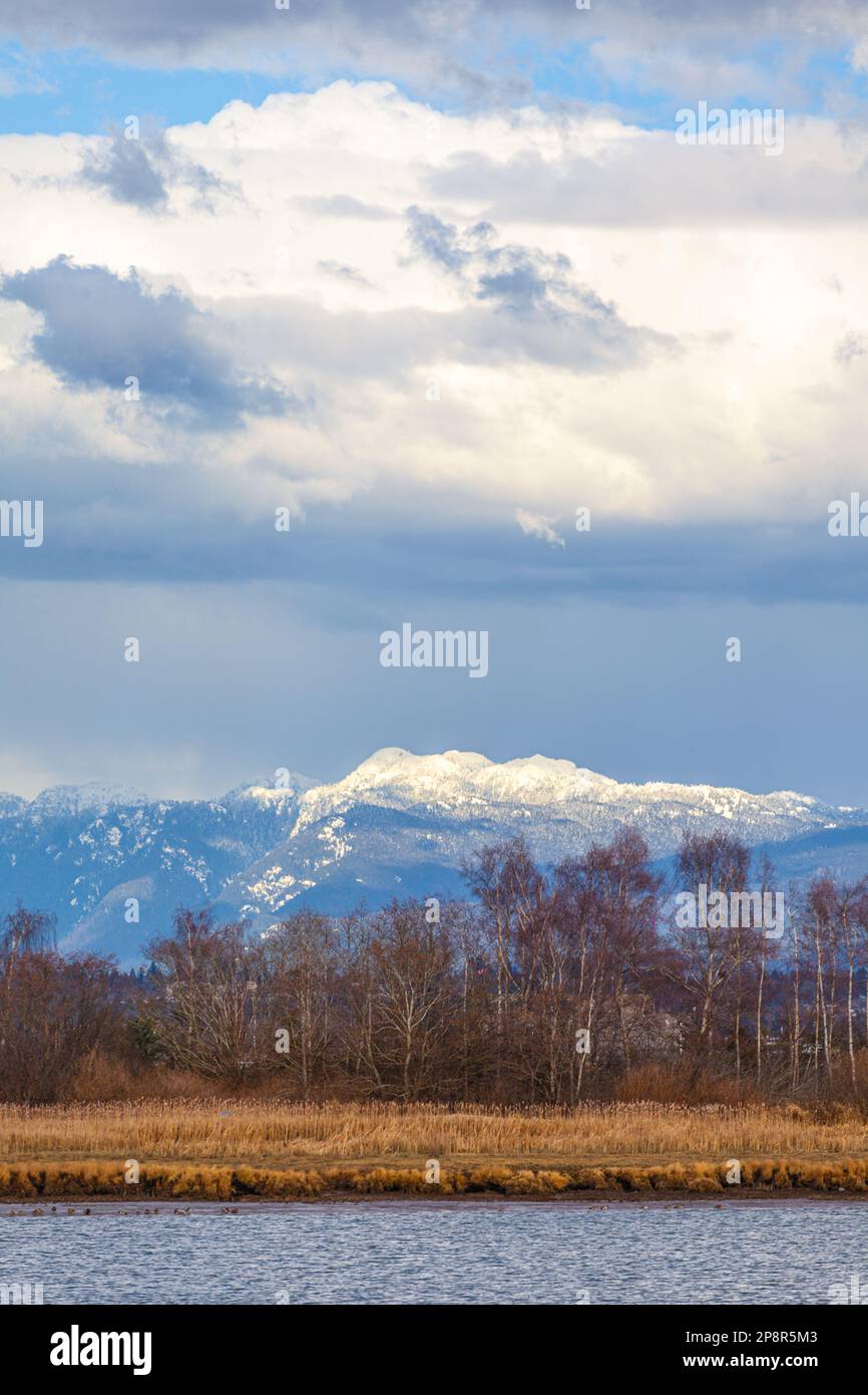 Coastal mountains rising above Vancouver in British Columbia Canada ...