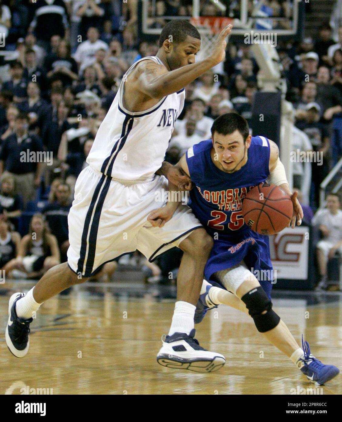Nevada guard Lyndale Burleson, left, tries to stop Louisiana Tech guard ...