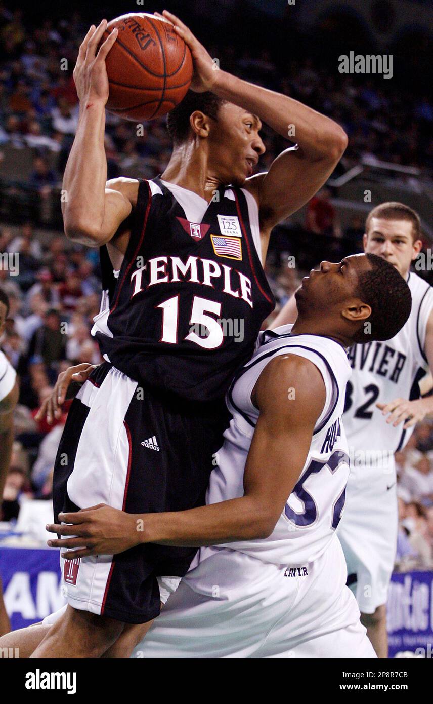 Temple's Semaj Inge, left, pulls down a rebound on top of Xavier's ...