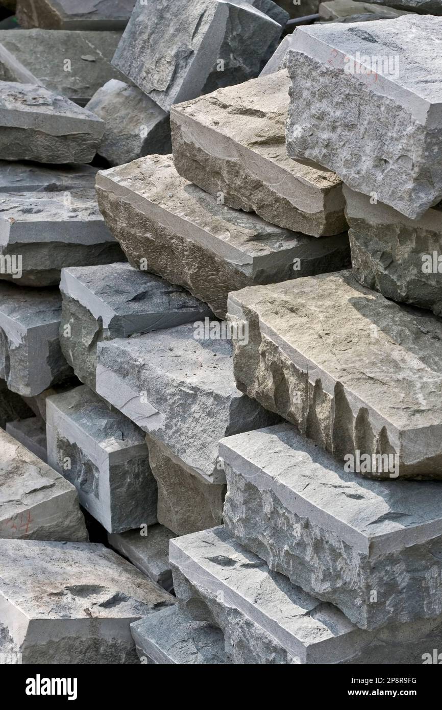 Sandstone blocks made of natural stone and carved by hand Stock Photo ...