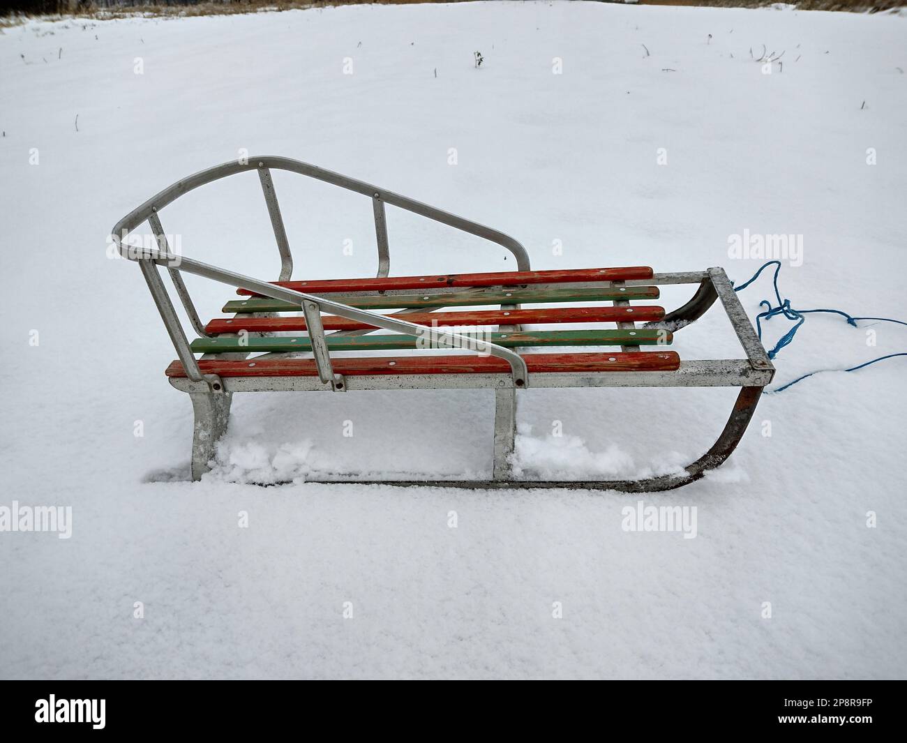 children's sledge on the snow Stock Photo - Alamy
