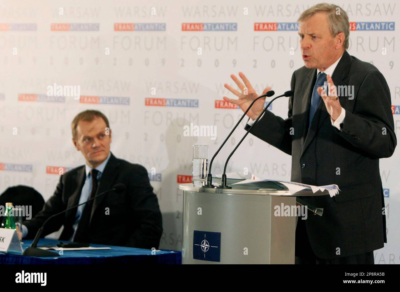 NATO Secretary-General Jaap de Hoop Scheffer, right, speaks during a ...