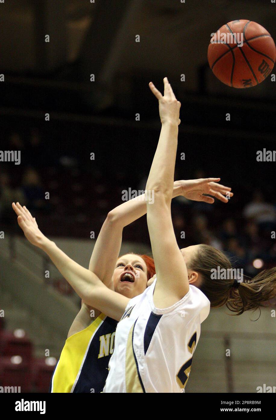 Northern Arizona's Katie Schafer, left, knocks basketball away from ...