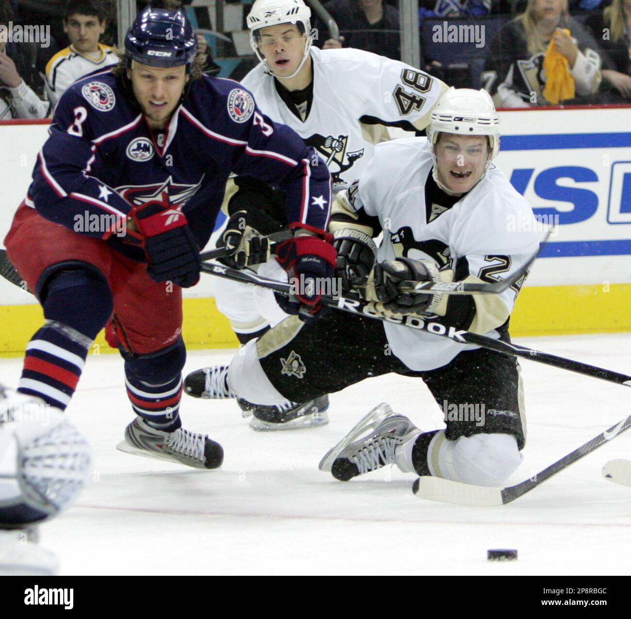 Pittsburgh Penguins' Matt Cooke (24) shoots the puck in front of ...