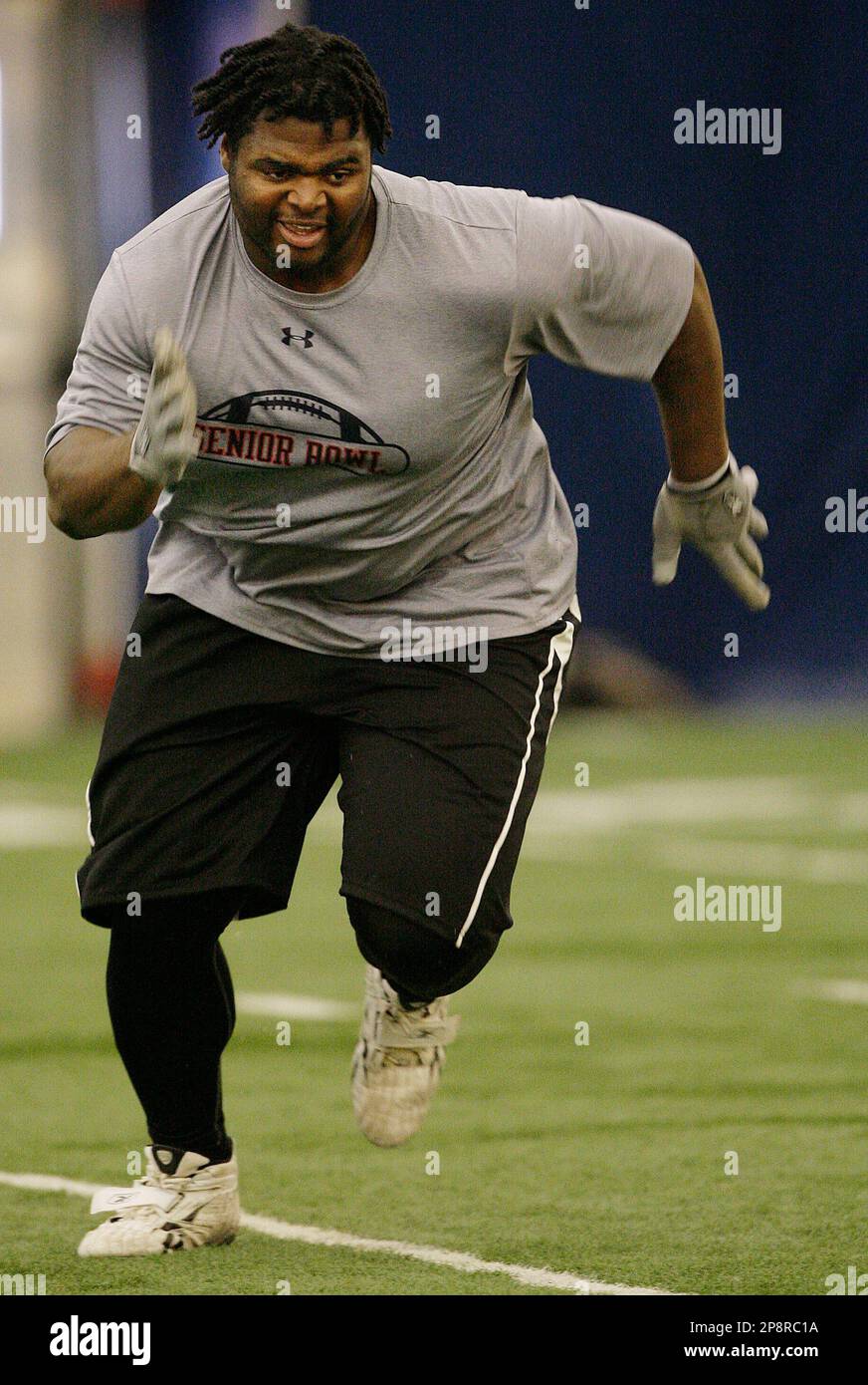Boston College defensive tackle BJ Raji runs a defensive line drill ...