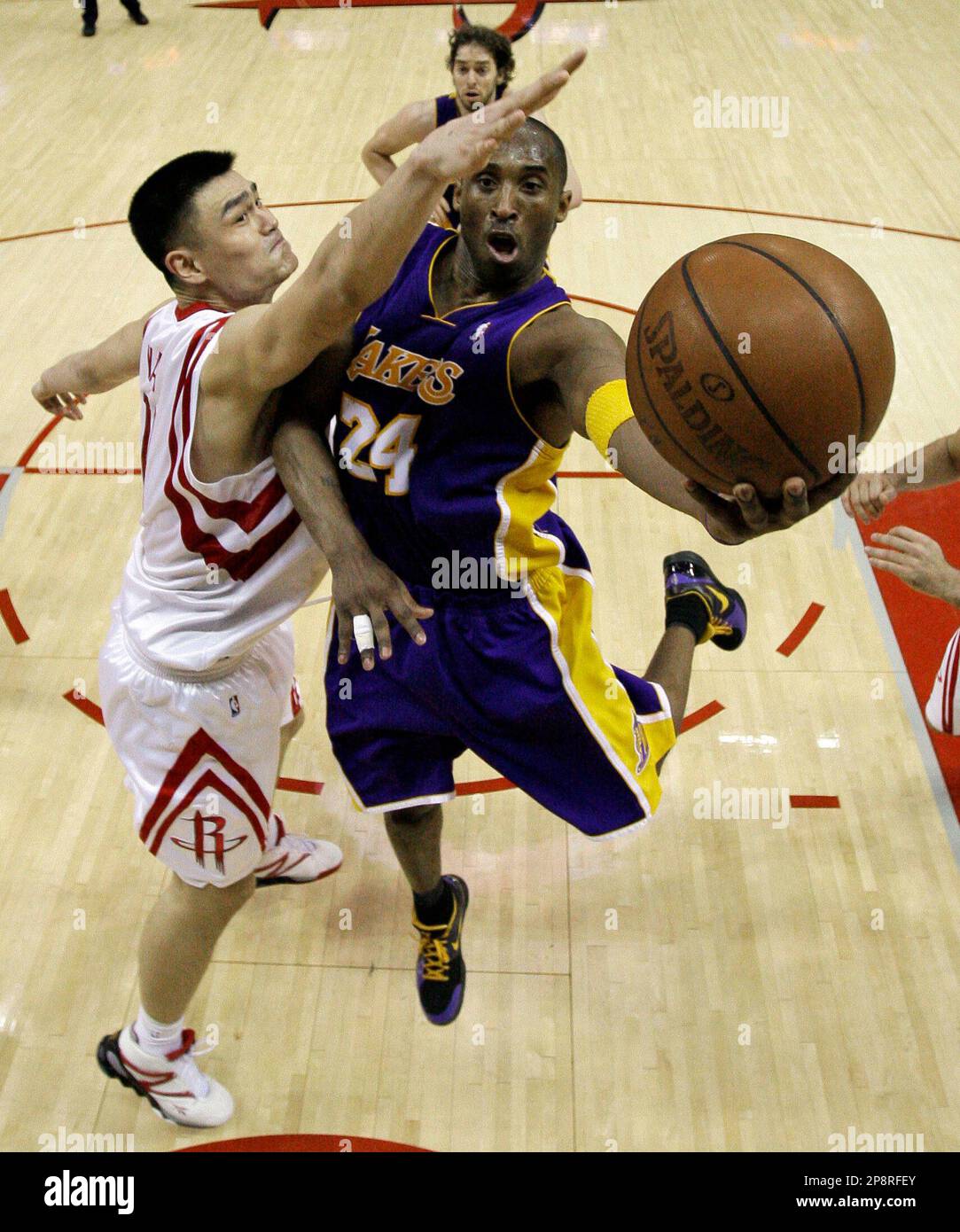 Los Angeles Lakers' Kobe Bryant (24) goes up for a shot as Houston ...