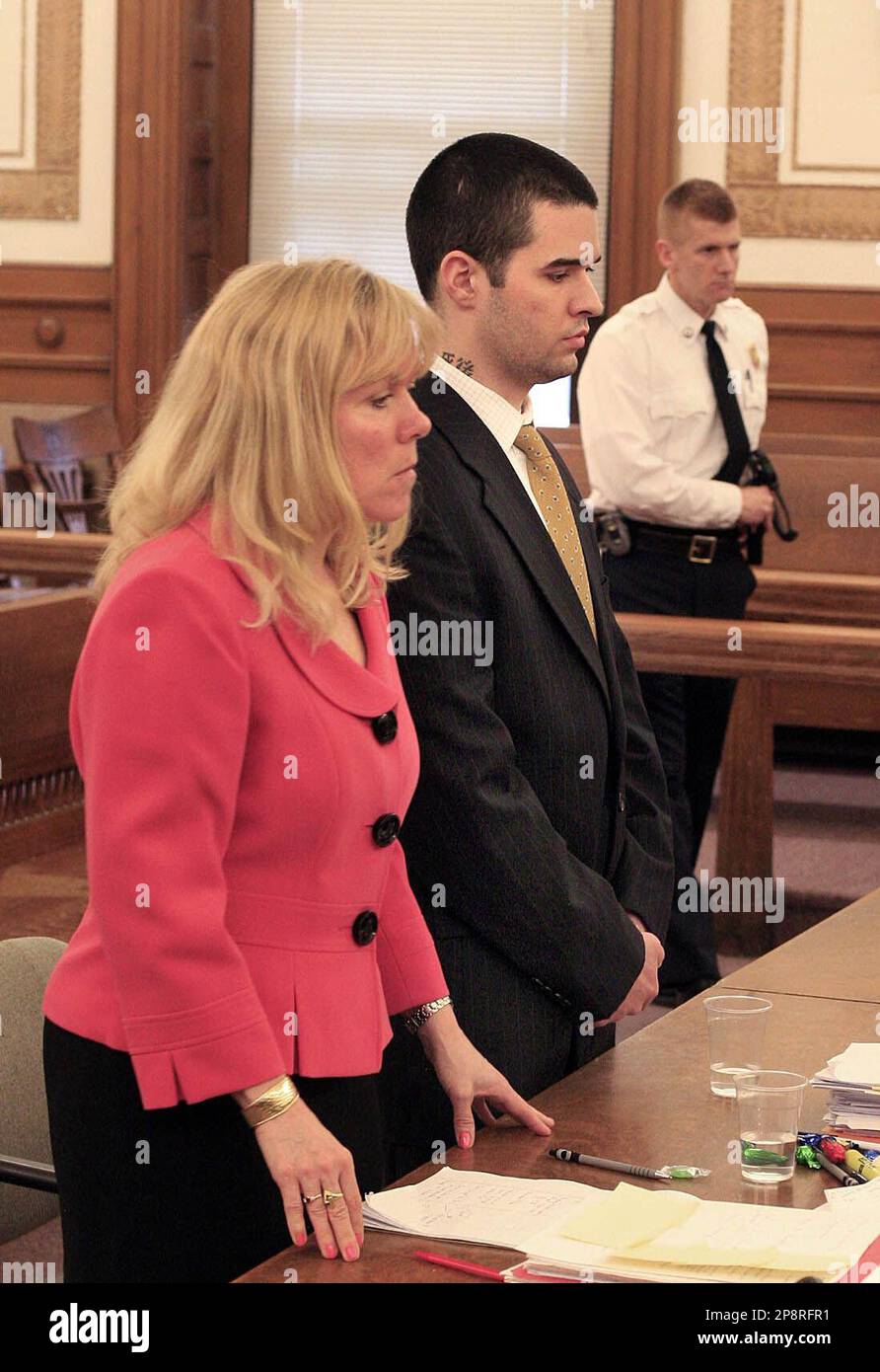Defendant Ryan Bois, stands with his lawyer Beverly Cannone at Norfolk ...