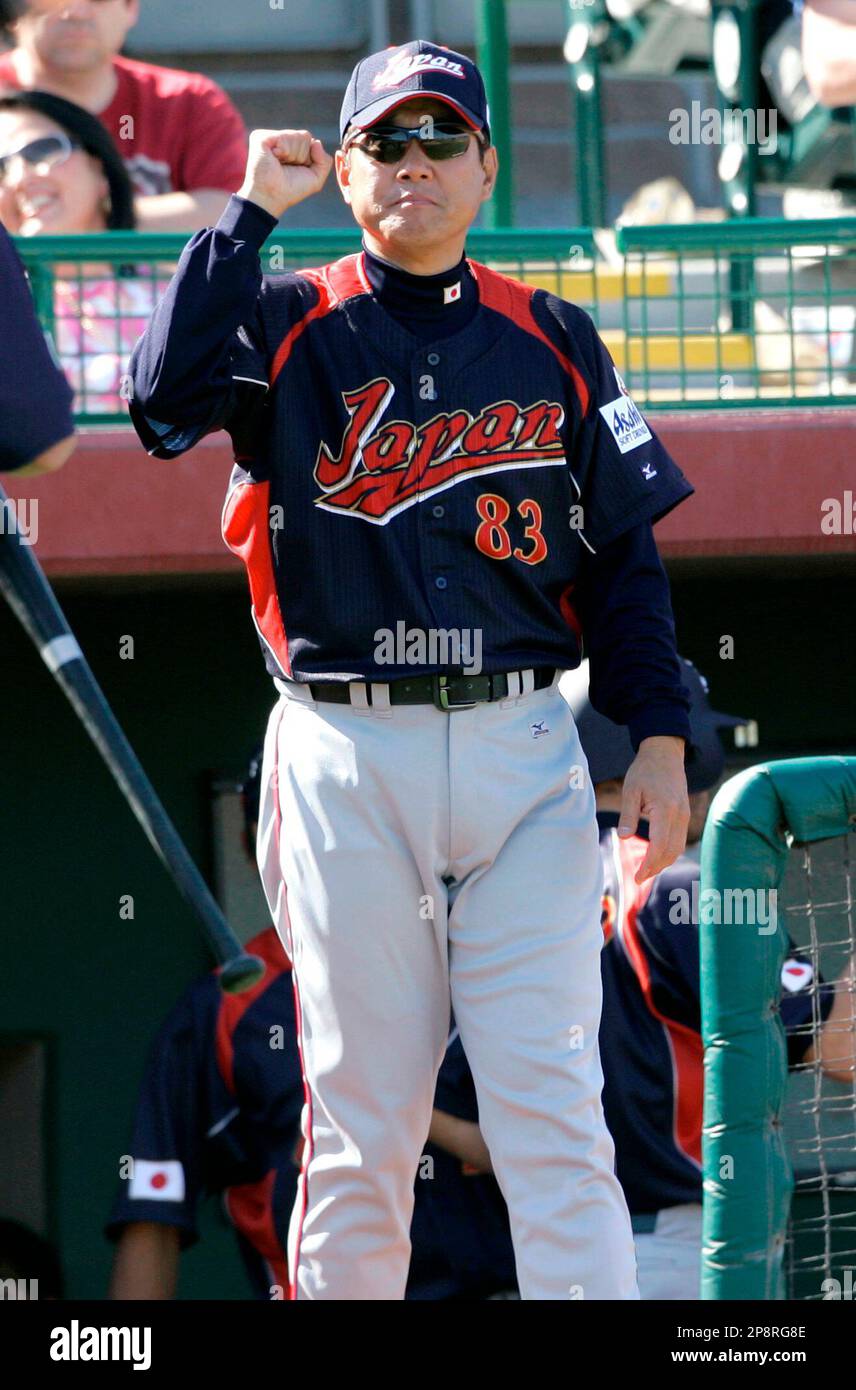 Japan manager Tatsunori Hara celebrates a run by Ichiro Suzuki during ...