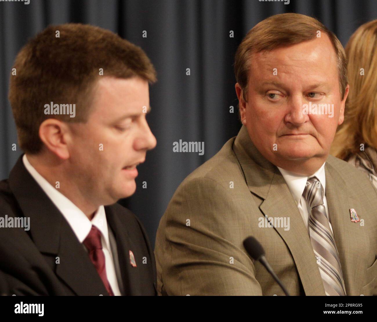 Launch Director Mike Leinbach, right, listens as Mike Moses, Chairman ...