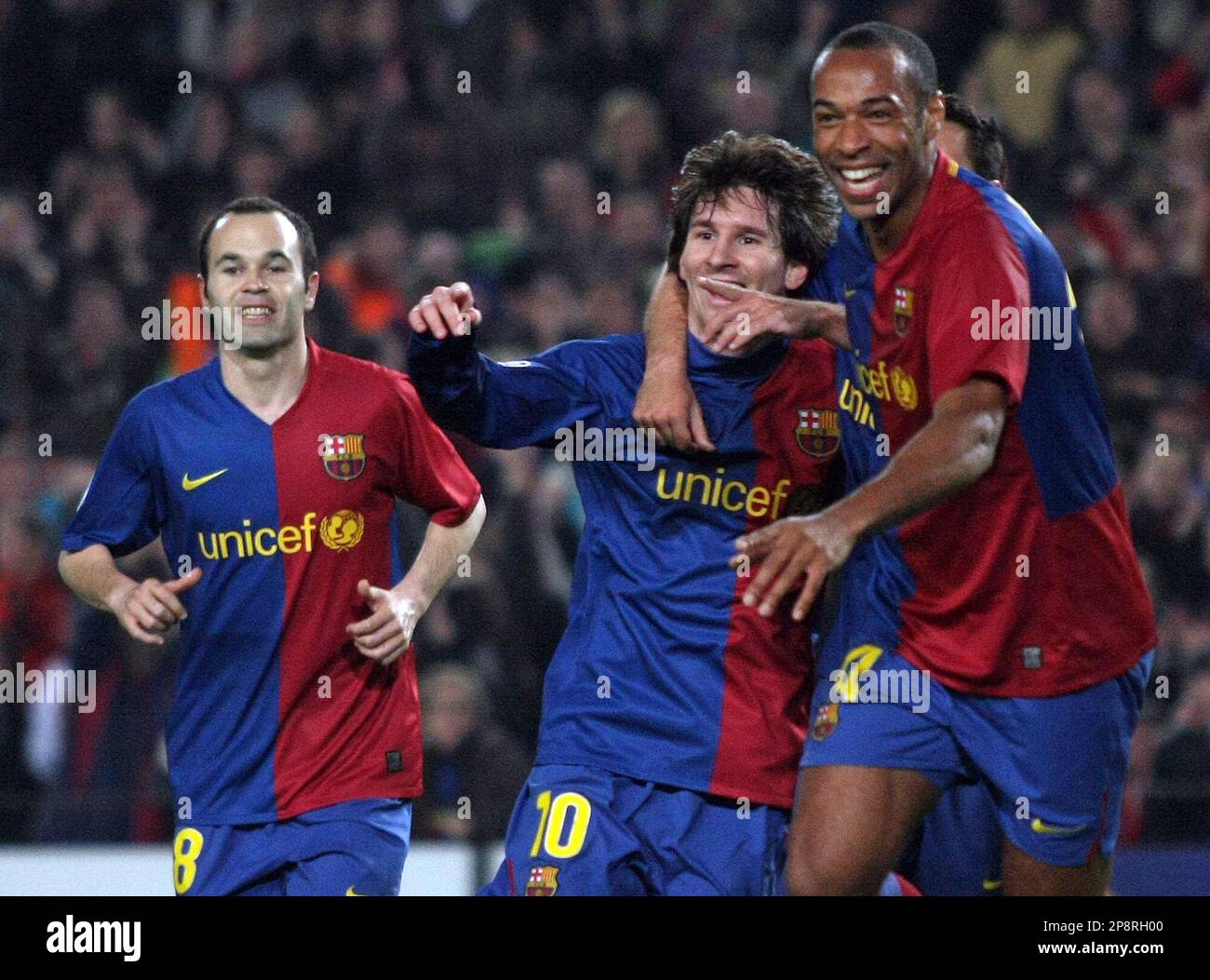 Barcelona's Lionel Messi, center, of Argentina reacts with teammate ...
