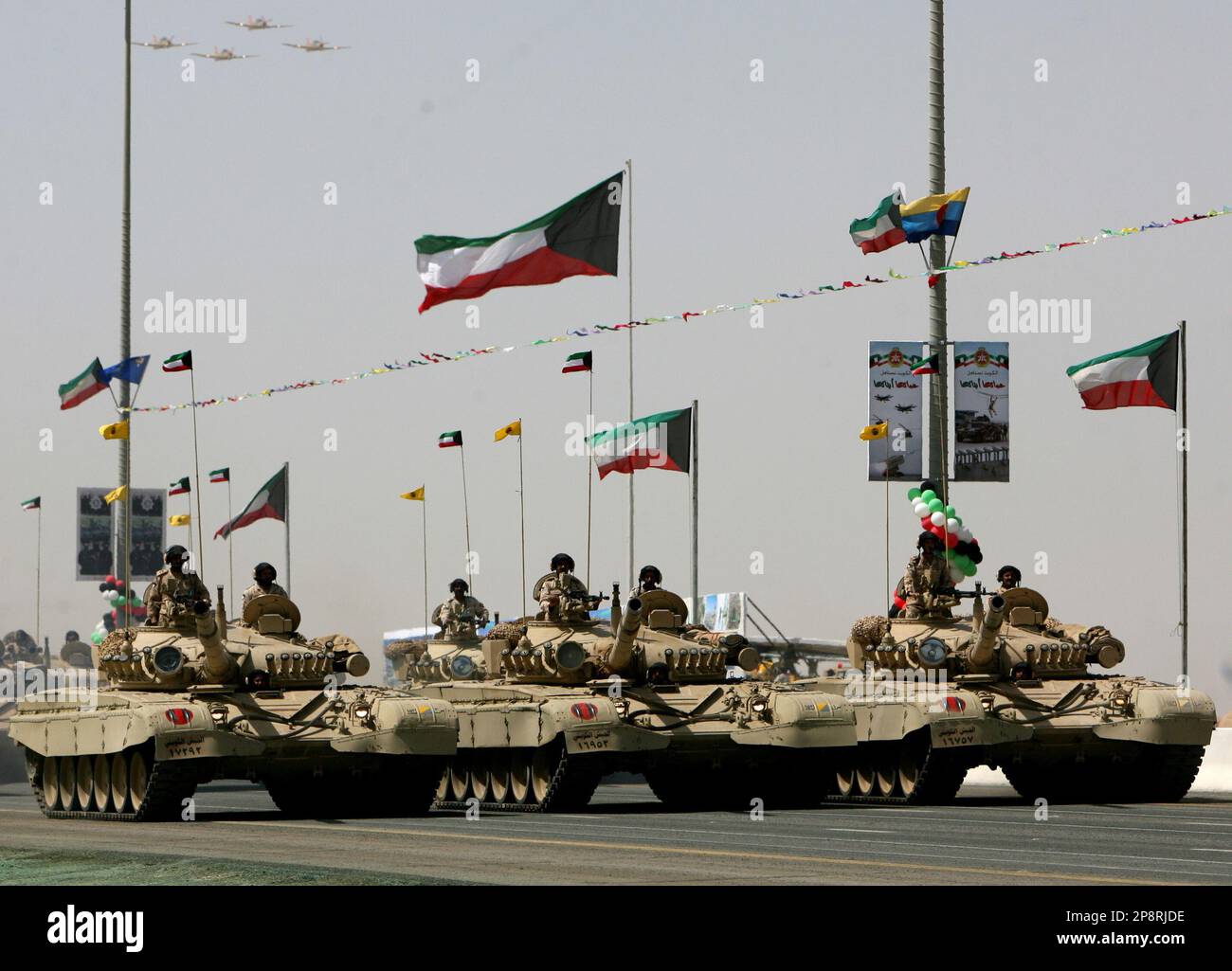 US-made M1A1 heavy battle tanks from Kuwait's Armored Brigade, parade ...