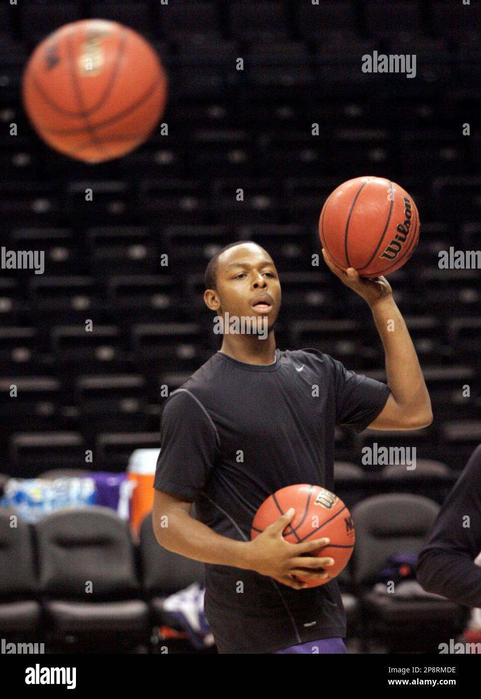 Kansas State's Jacob Pullen looks to pass a ball during an NCAA college ...