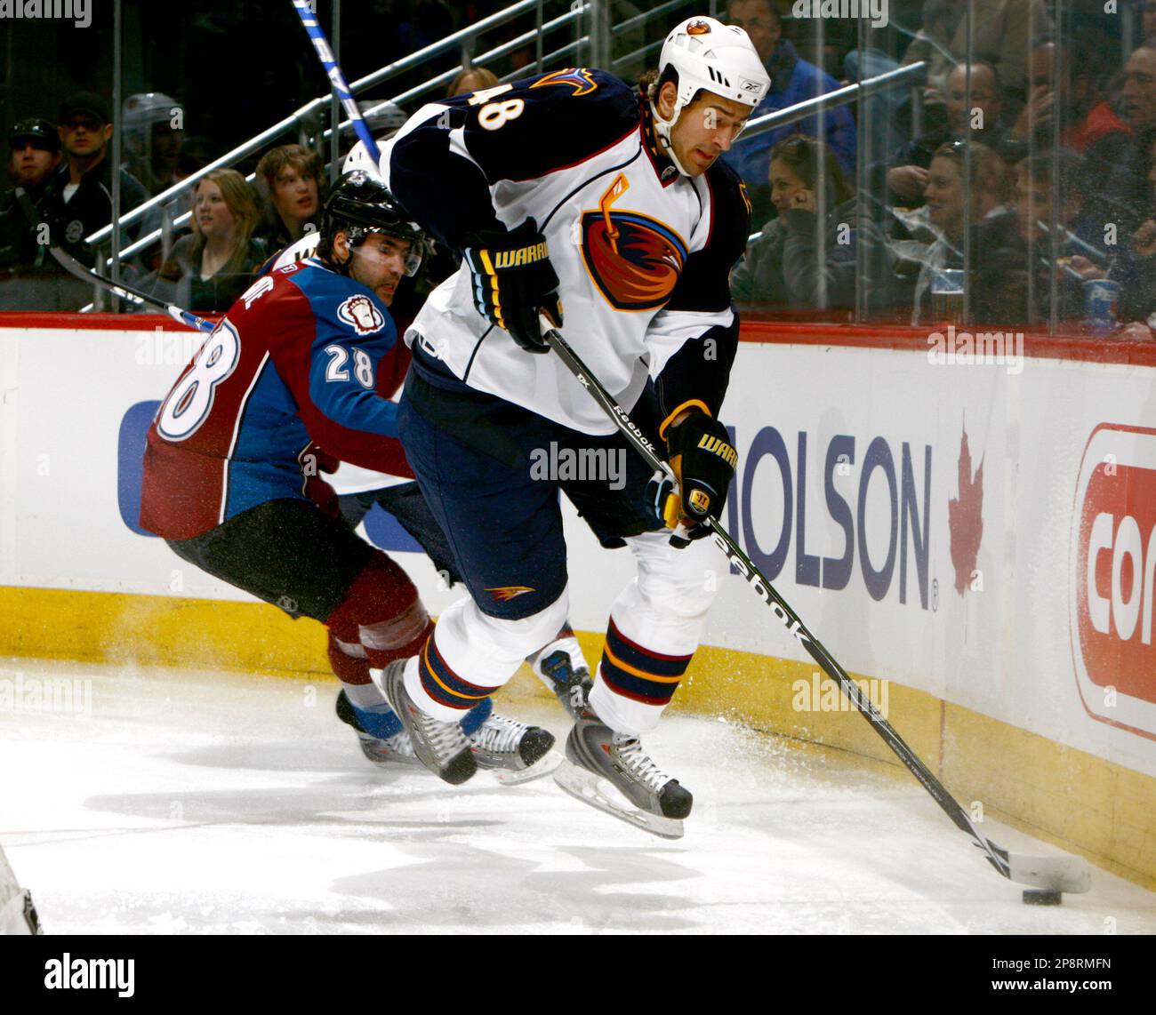 Atlanta Thrashers defenseman Boris Valabik, front, of Slovakia, picks ...