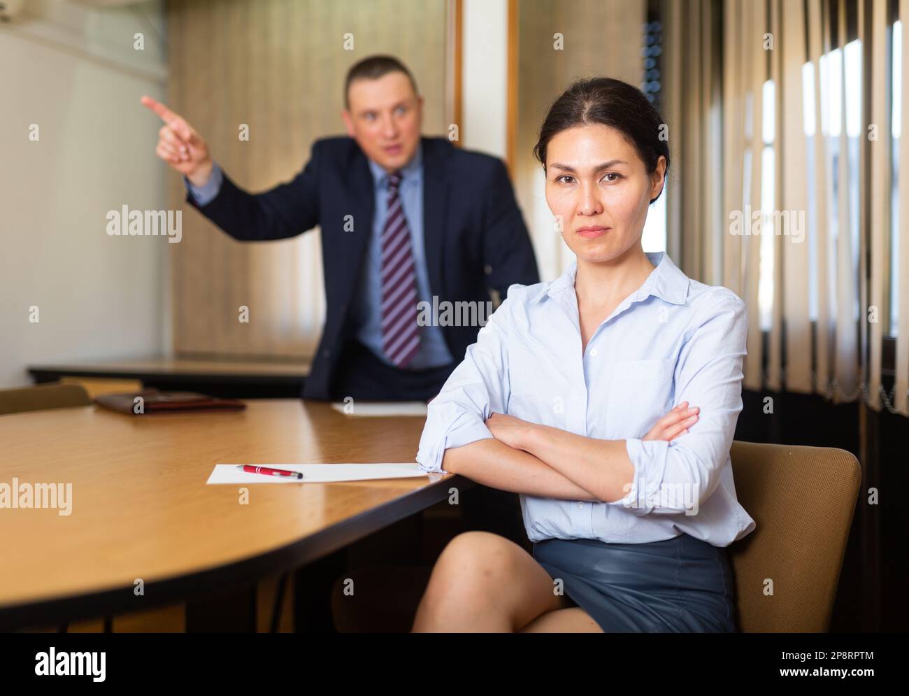 Angry boss firing female colleague hi-res stock photography and images ...