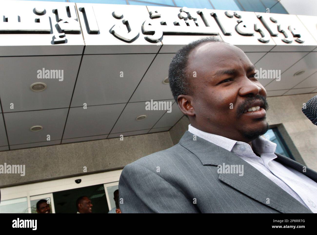 Sudanese state minister of humanitarian affairs Ahmed Haroun leaves the ...