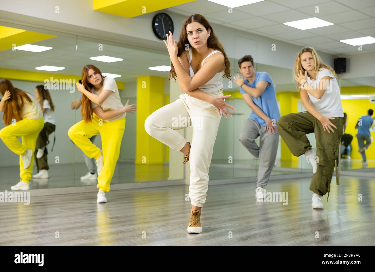 Young girl training breakdance Footwork moves in dance hall Stock Photo ...