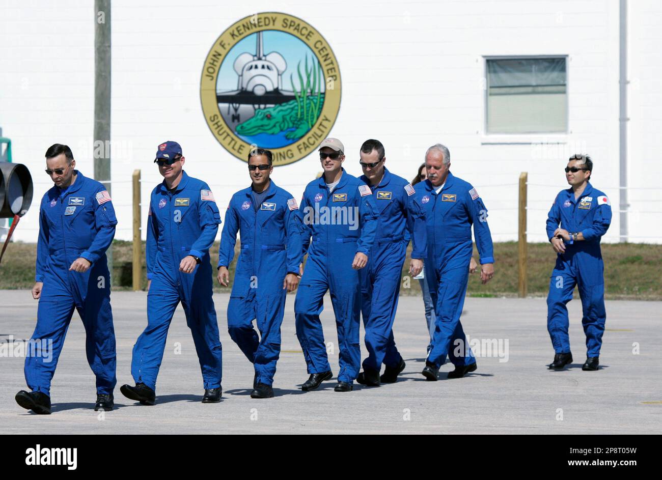 Space shuttle Discovery astronauts from left, commander Lee Archambault ...