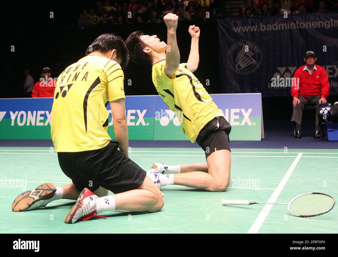 China's Cai Yun, right, and Fu Haifeng celebrate winning their men's ...