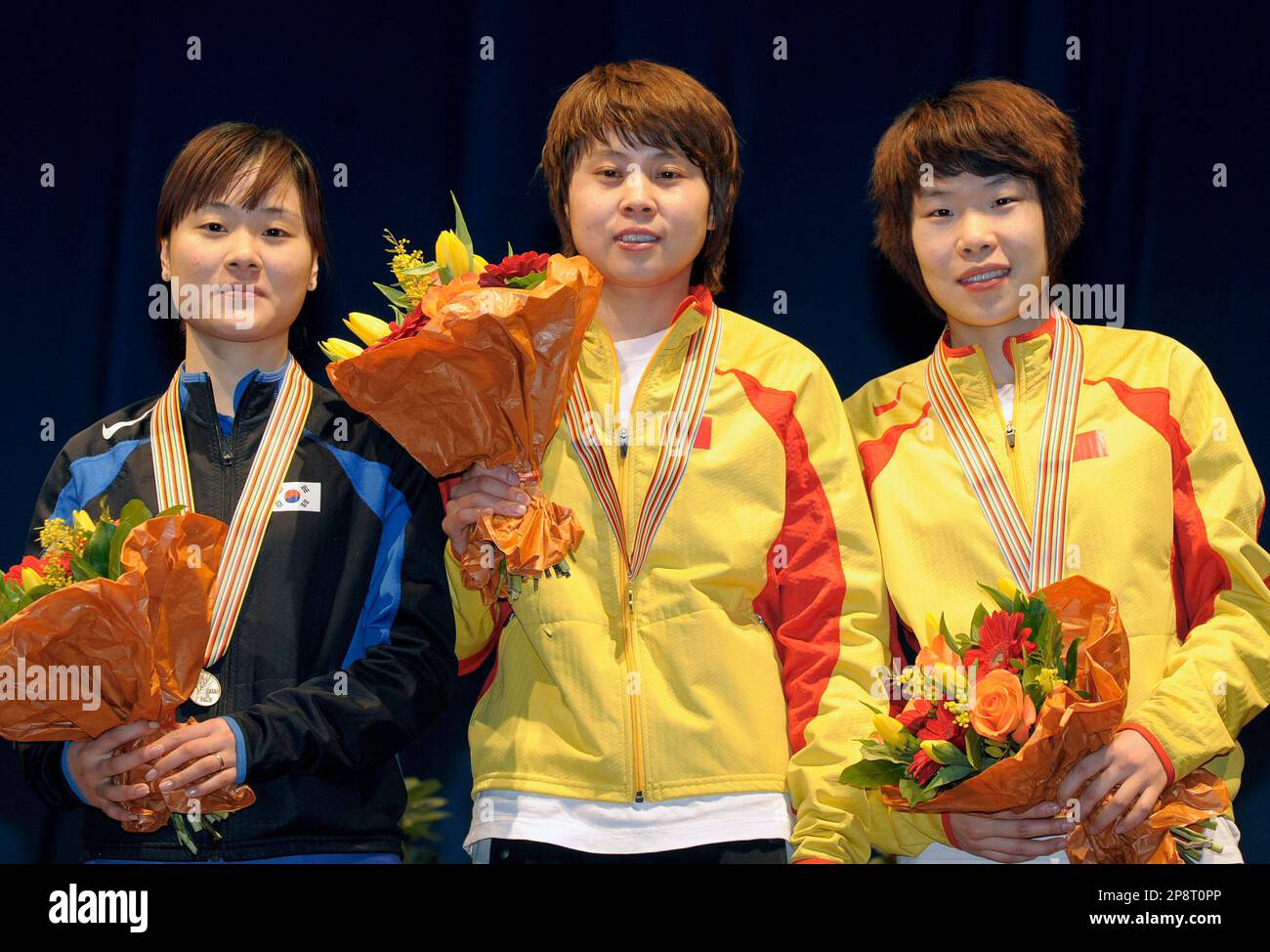 Gold medalist China's Wang Meng, center, silver medalist Korea's Kim ...