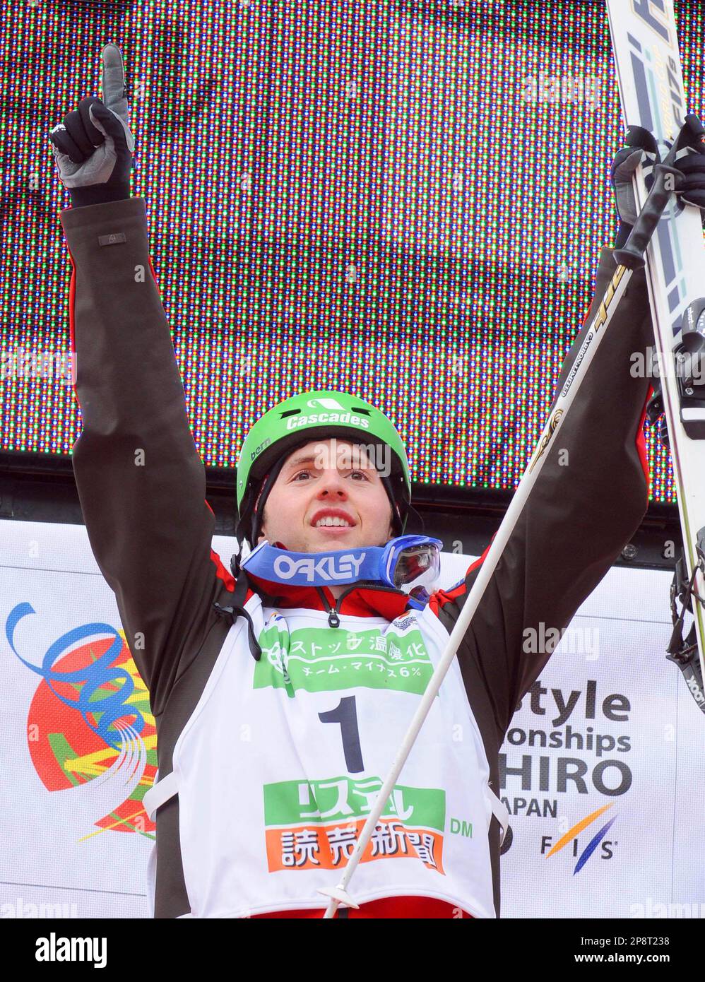 Alexandre Bilodeau of Canada raises his ski during winners ceremony of ...