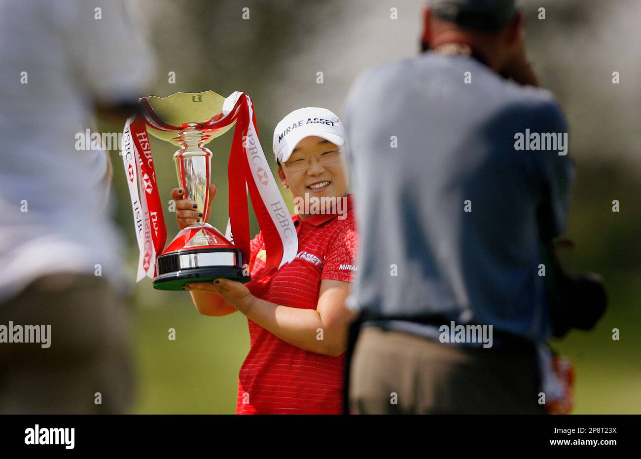 Ji Yai Shin of South Korea is all smiles as she poses for photographers ...