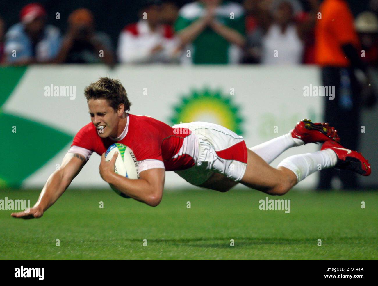 Aled Thomas from Wales dives to score a try against Argentina during ...