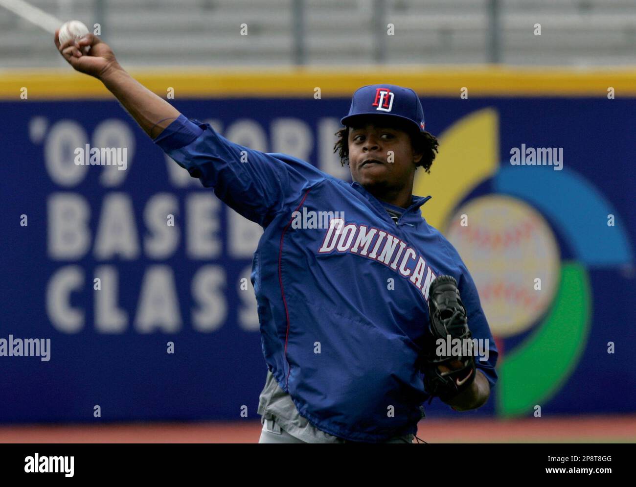 Dominican Republic's pitcher Edison Volquez throws a ball during a ...