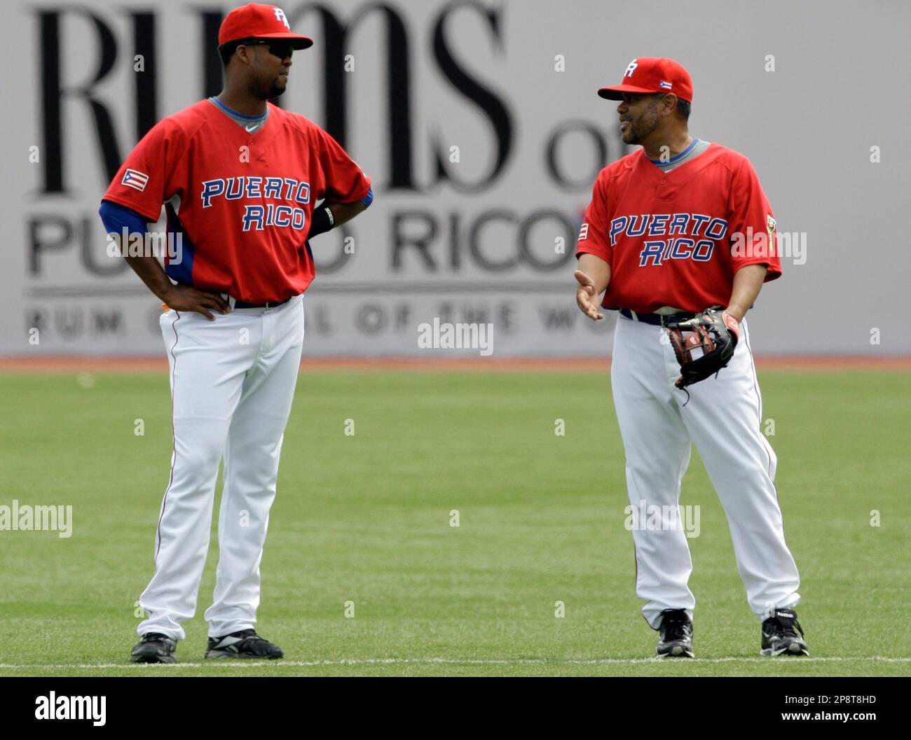 Puerto Rico's team manager Jose "Cheito" Oquendo, right, speaks with ...