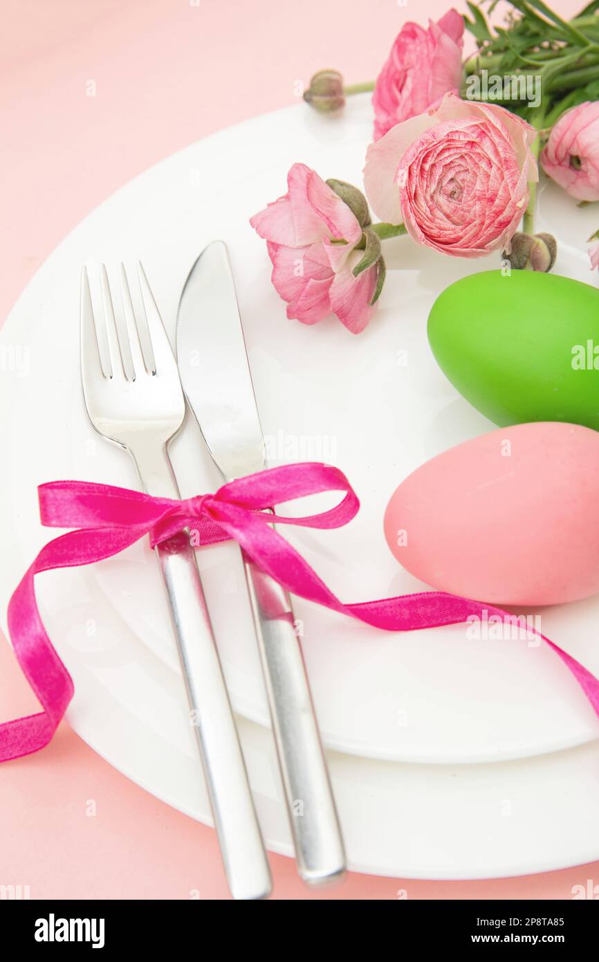 Happy Easter celebration table. Easter eggs and buttercups flower ...