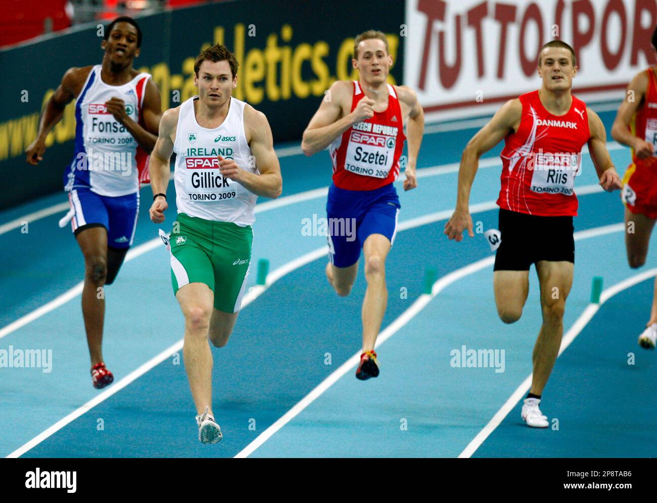 Ireland's David Gillick, 2nd left, competes in a Men's 400m heat during ...