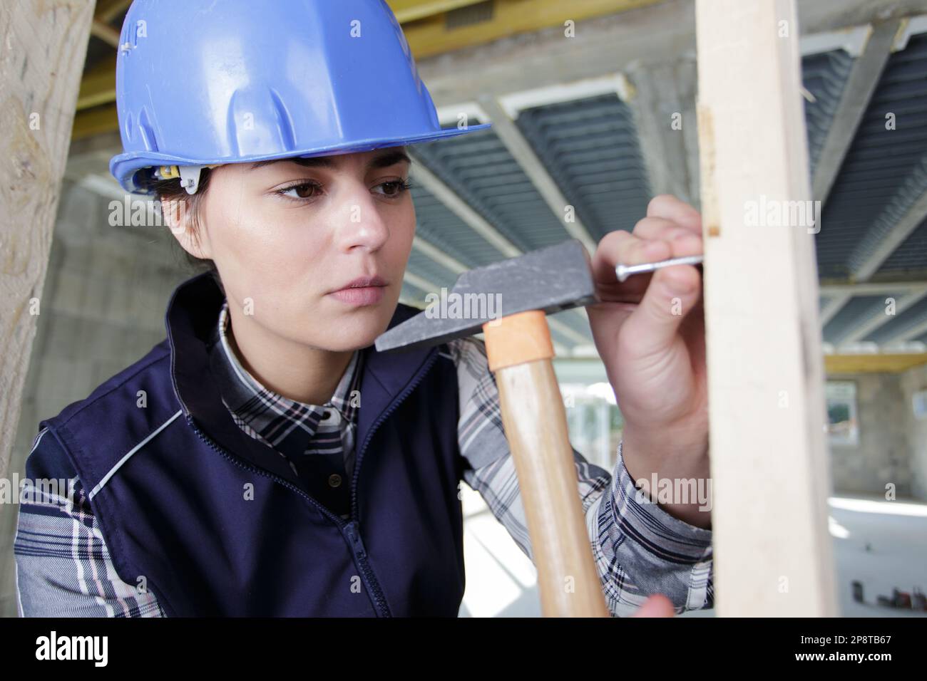 female builder on traditional construction Stock Photo - Alamy