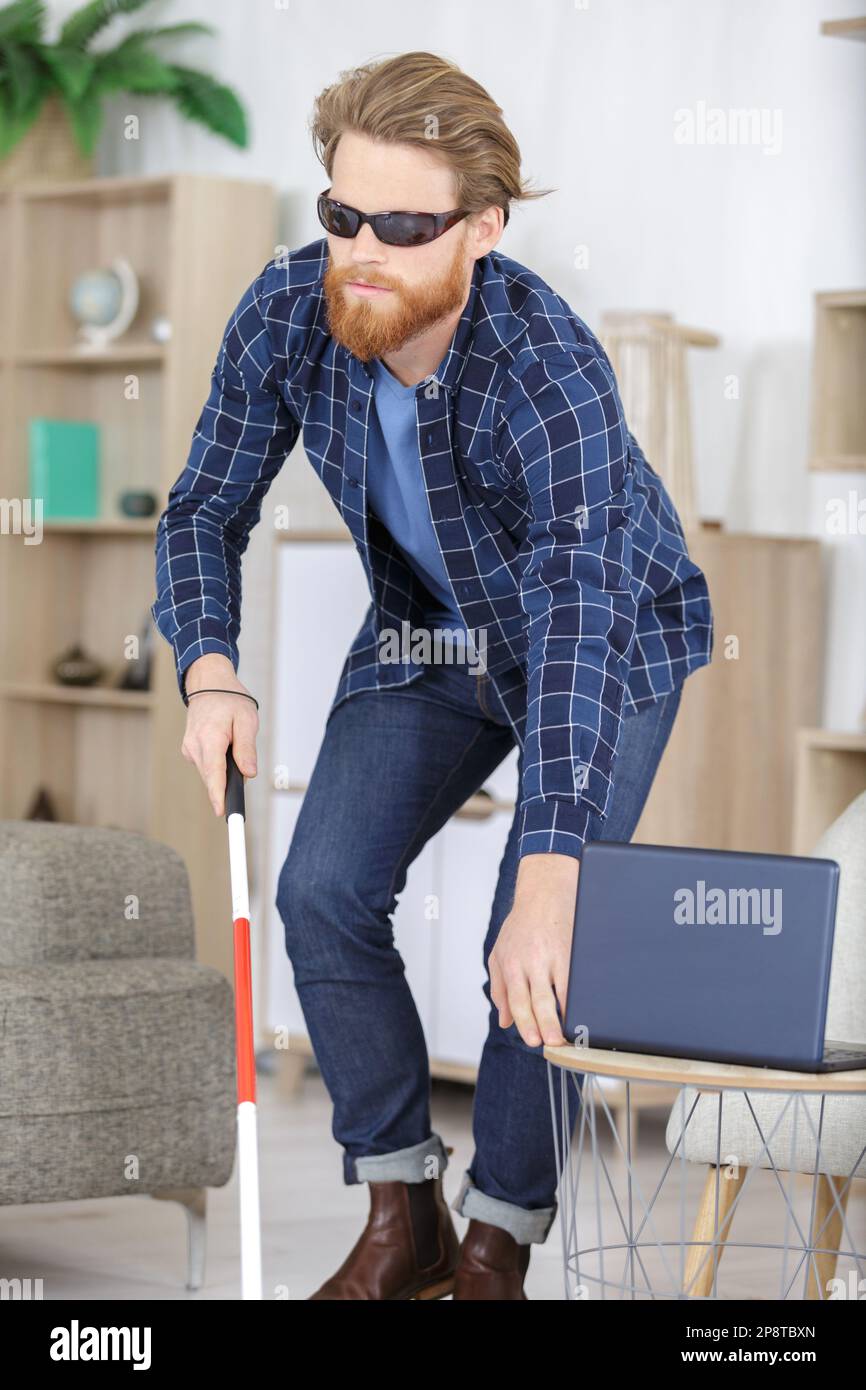 a blind man at home Stock Photo - Alamy