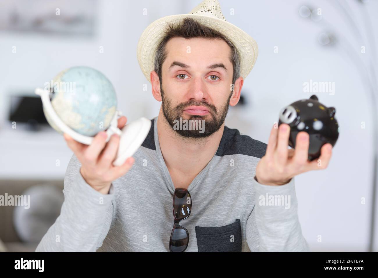 male traveller does not know where to go Stock Photo - Alamy