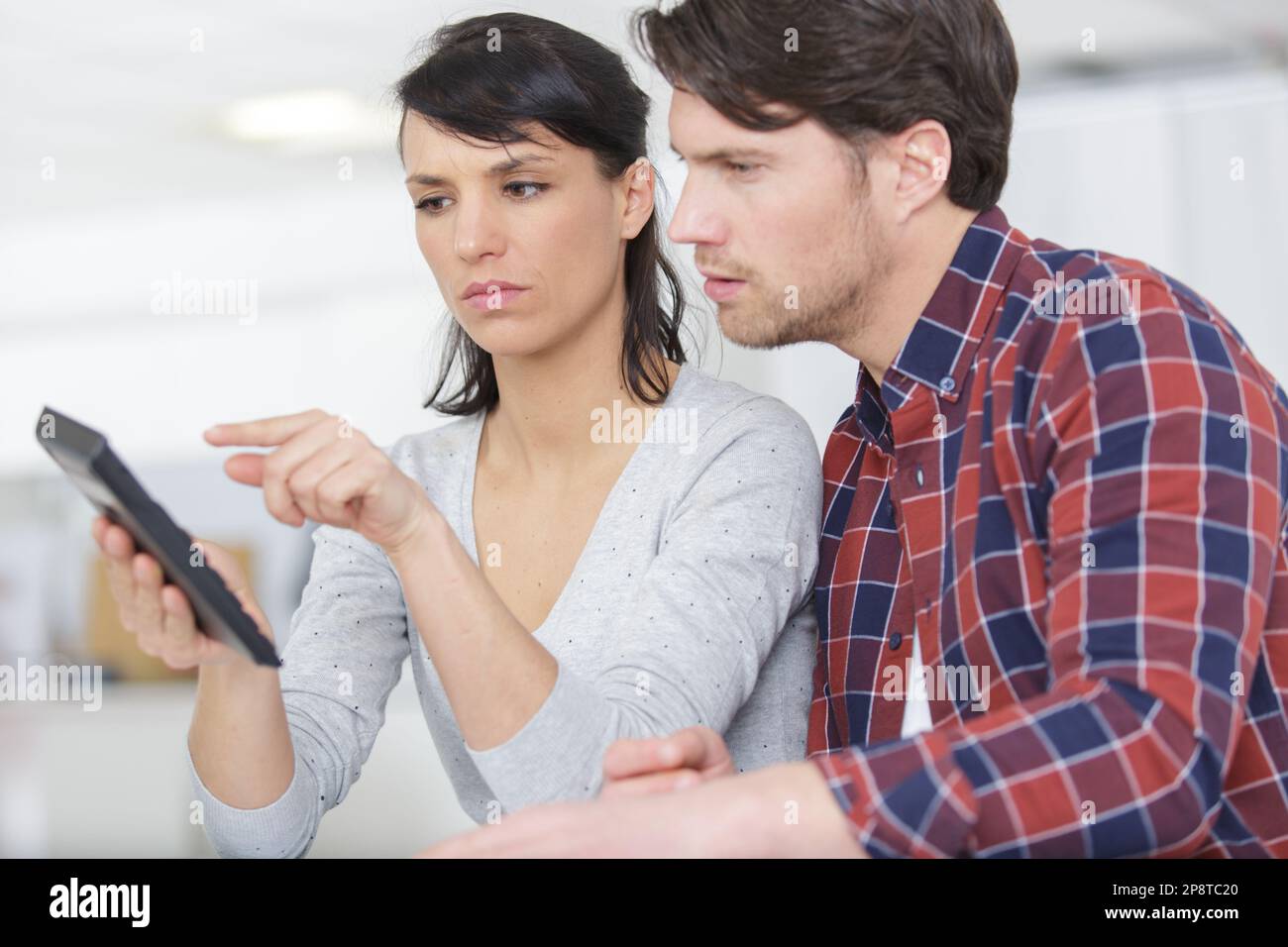 woman and man doing paperwork together Stock Photo - Alamy