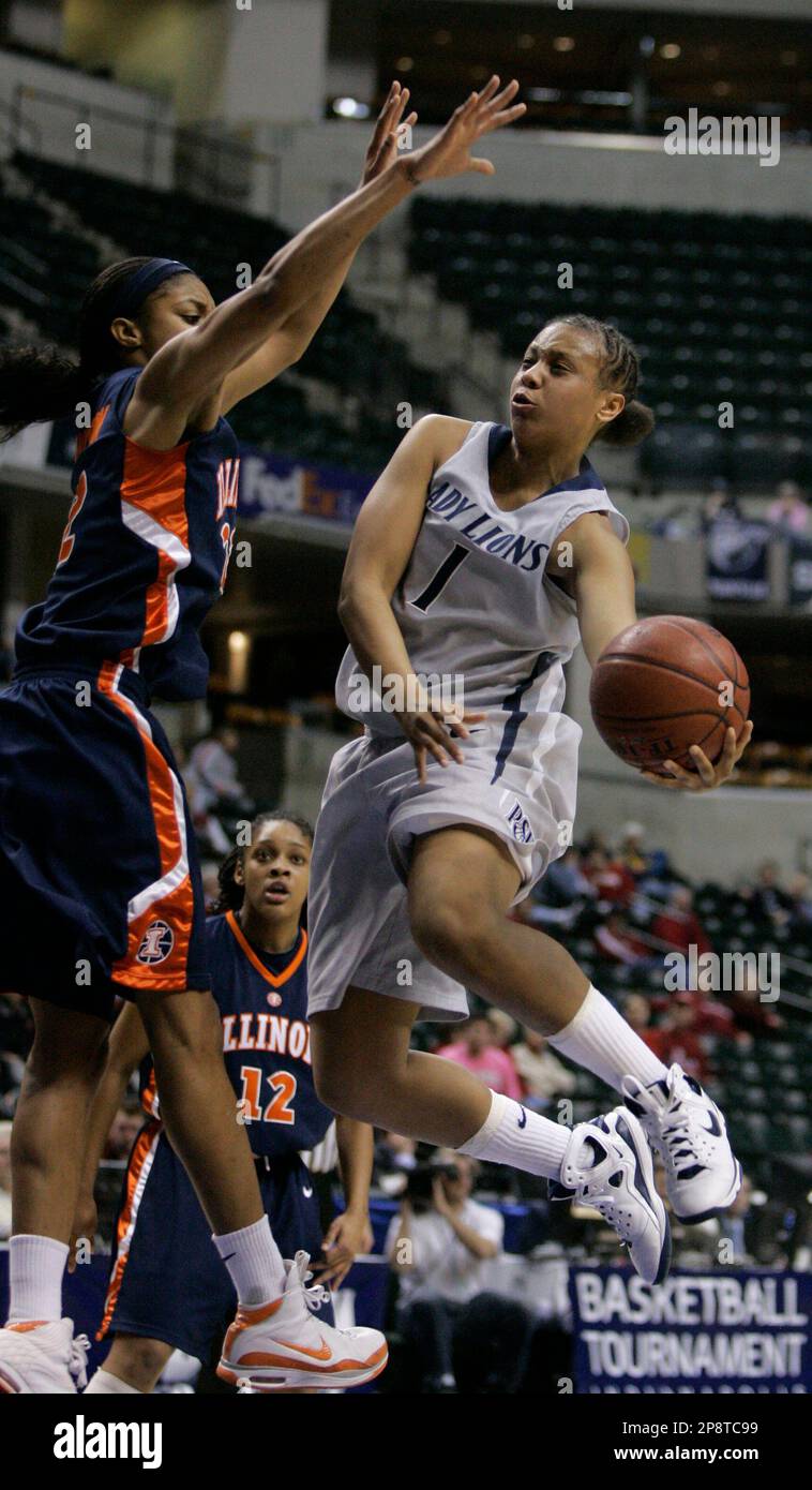 Penn State guard Tyra Grant, right, puts up a shot against Illinois ...