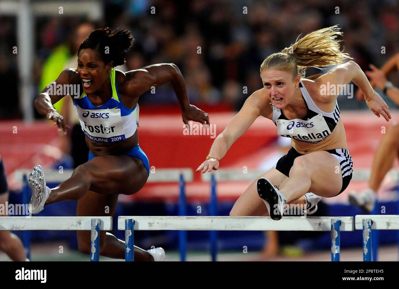 Jamaica's Brigitte Foster, left, and Australia's Sally McLellan compete ...