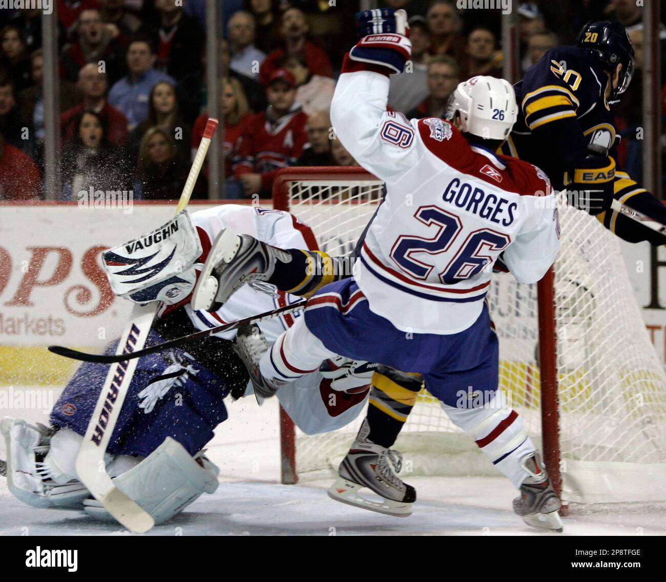 Buffalo Sabres' Daniel Paille (20) collides with Montreal Canadiens ...