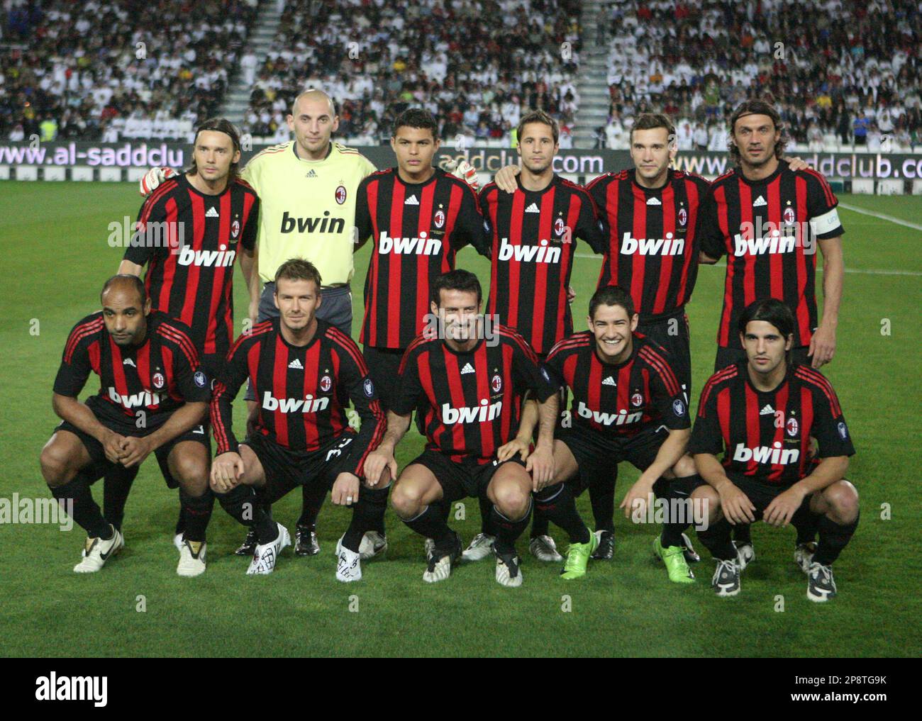 The AC Milan team pose for a team photo before the start of their match ...