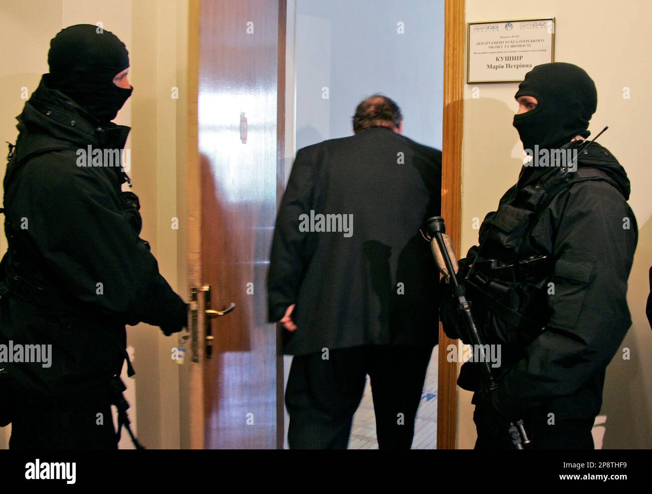 Ukrainian national security service armed agents wearing masks raid the ...