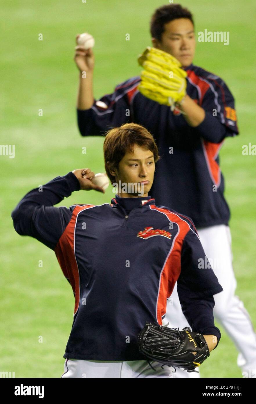 Team Japan pitchers, Yu Darvish, foreground, and Masahiro Tanaka, play ...