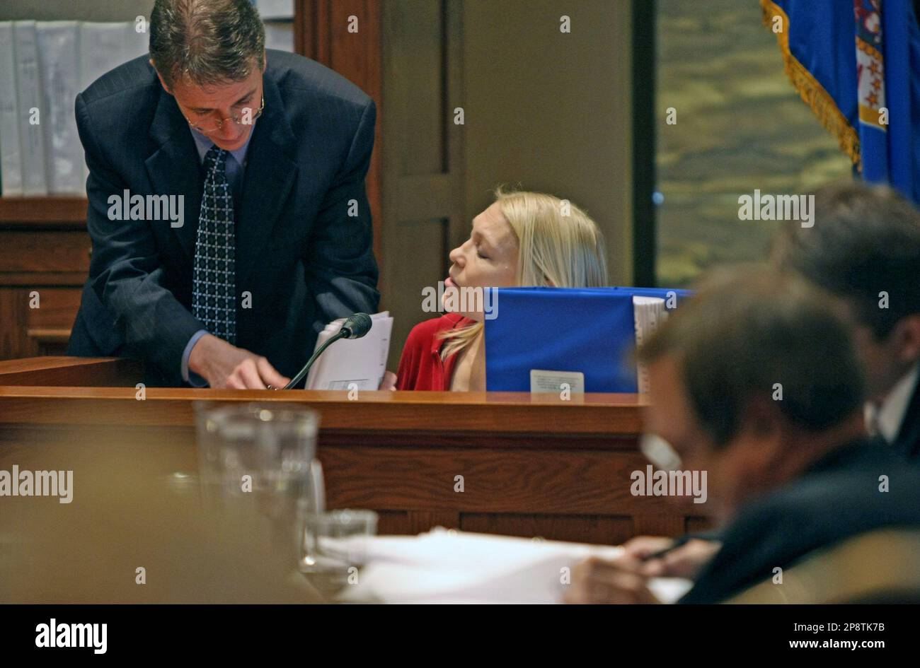 Al Franken Attorney Kevin Hamilton helps witness Emily Patton before ...