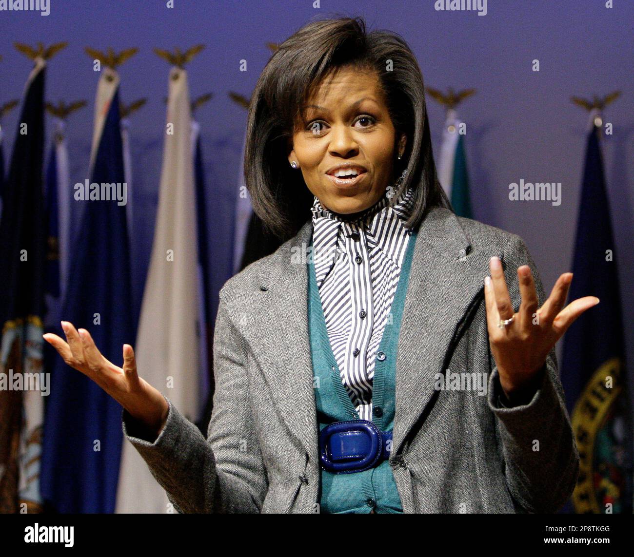 First lady Michelle Obama reacts as Retired Gen. Wilma L. Vaught, not ...
