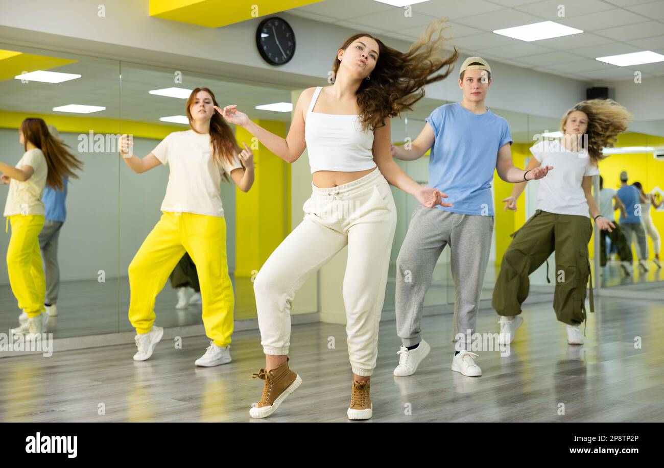 Young girl dancing modern dance in studio Stock Photo - Alamy