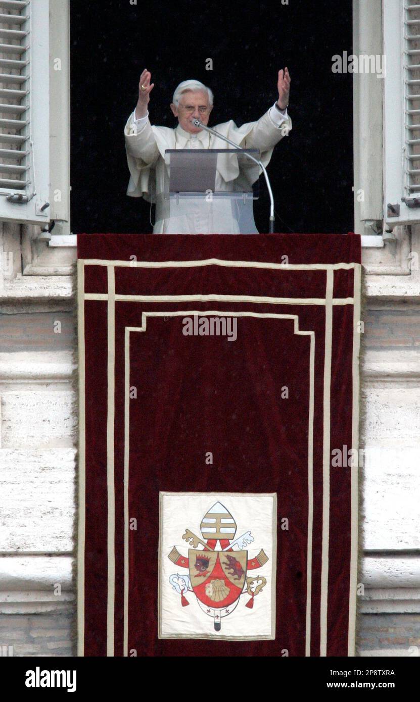 Pope Benedict XVI delivers his blessing during the Angelus noon prayer ...